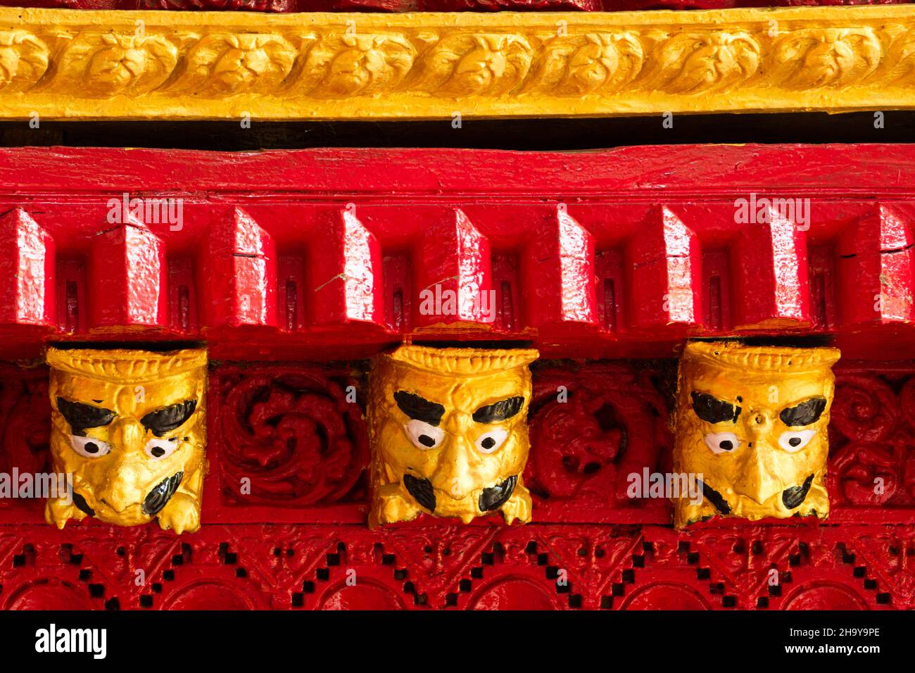 Detail of the painted wood carvings under the eaves of the Shesh ...