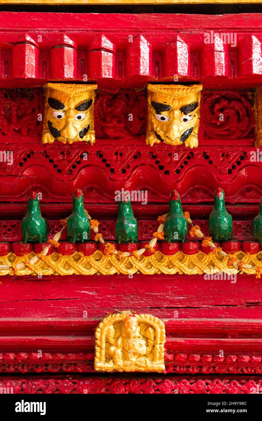 Detail of the painted wood carvings under the eaves of the Shesh ...
