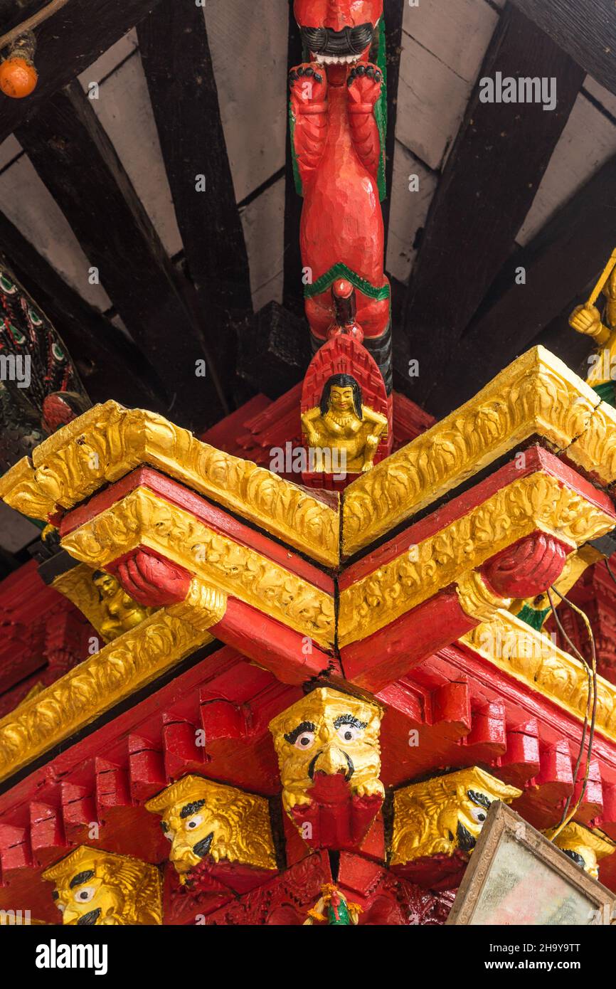 Detail of the painted wood carvings under the eaves of the Shesh ...