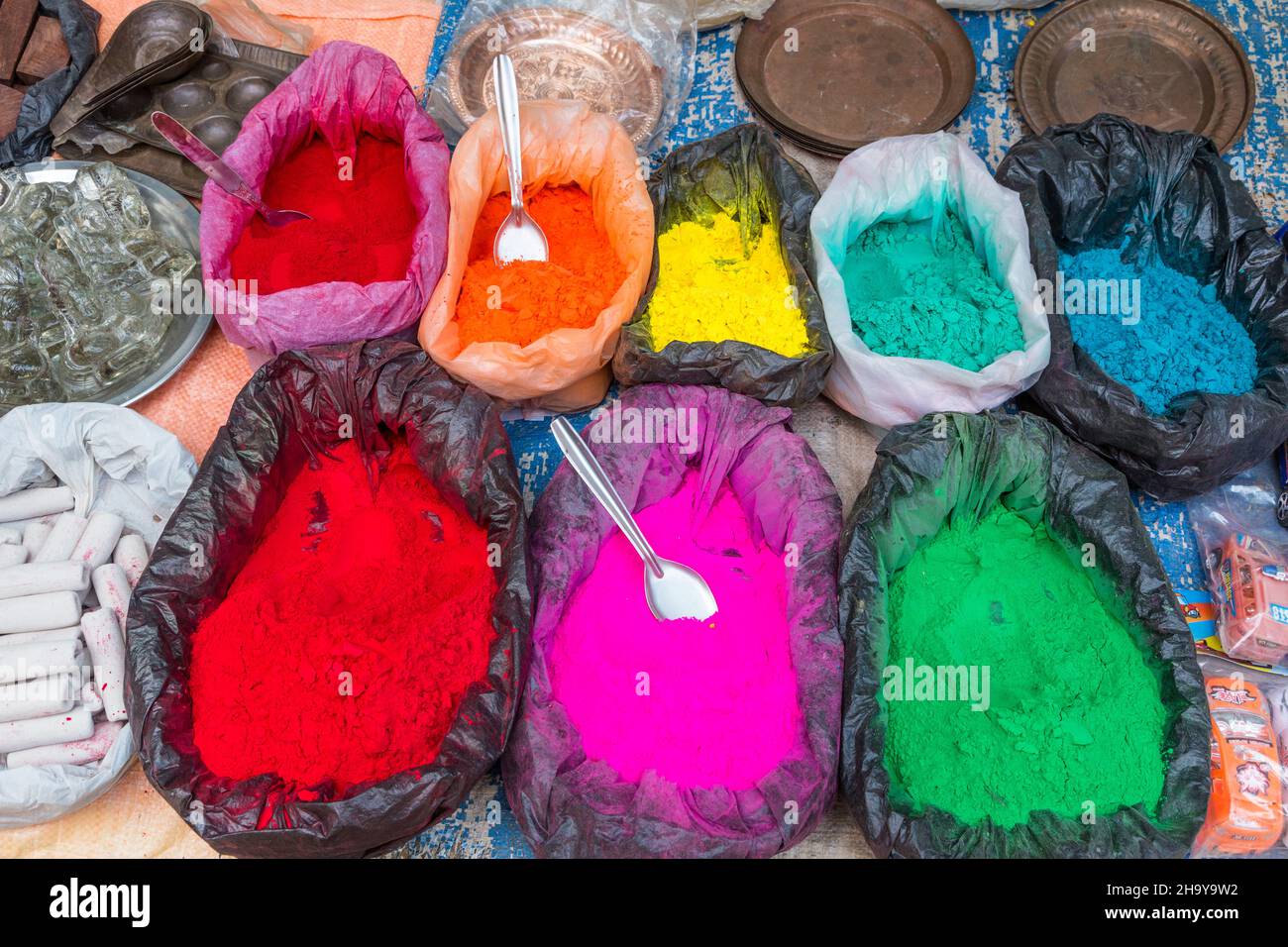 Colored powder called gulal is used in Hindu rituals, such as placing ...