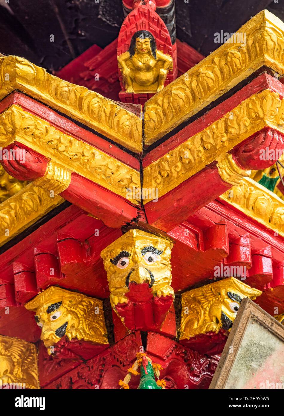 Detail of the painted wood carvings under the eaves of the Shesh ...