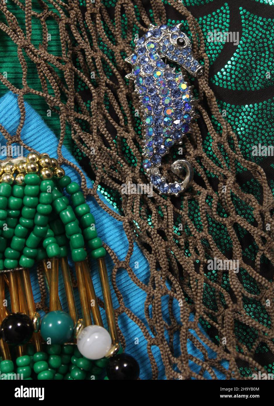 Mermaid Fashion With Jewelry and Fishing Net Stock Photo - Alamy