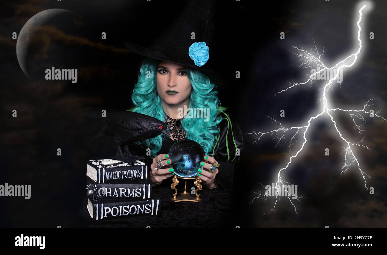 Green Hair Witch With Crystal Ball and Spell Books Stock Photo - Alamy