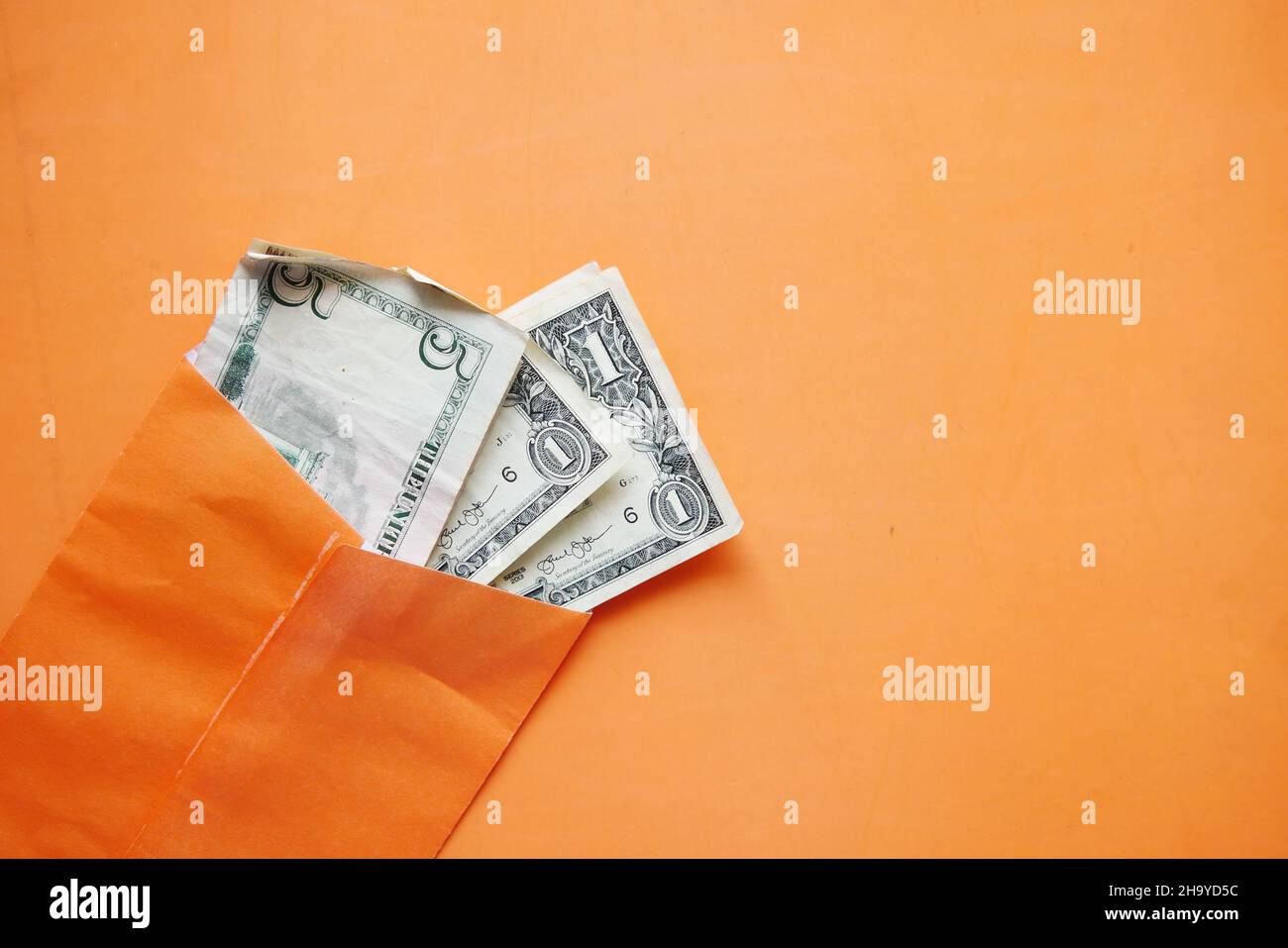 Envelope salary hi-res stock photography and images - Alamy