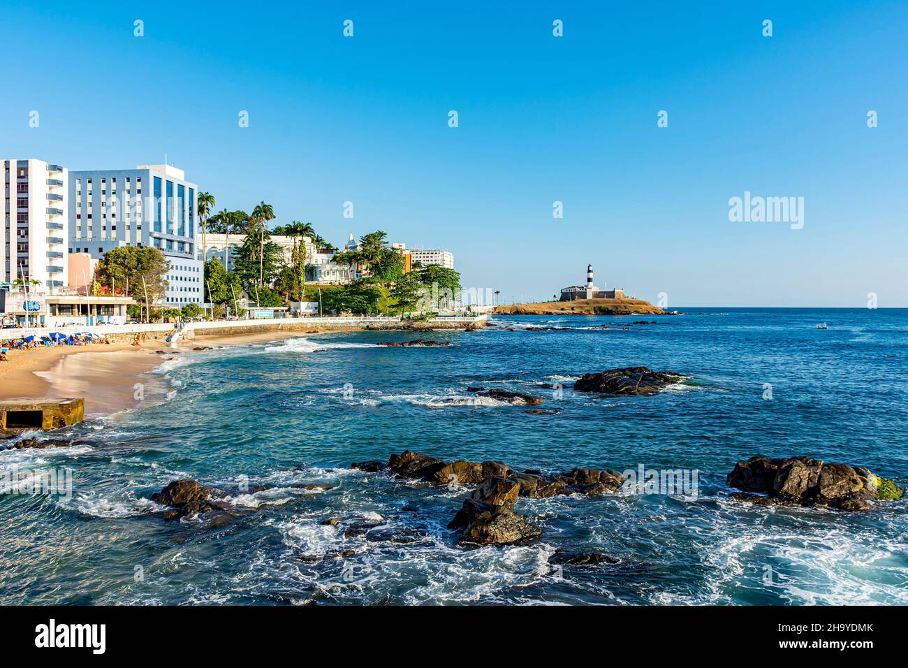 Famous Barra beach and lighthouse on the seafront of Salvador in Bahia ...