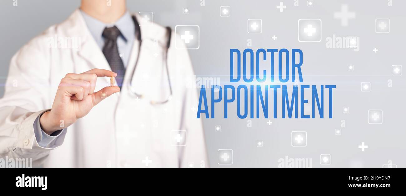 Doctor gives pill patient close hi-res stock photography and images - Alamy