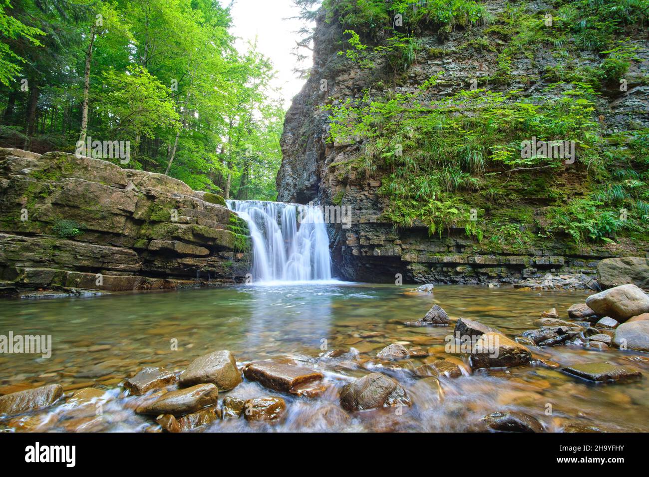 Strong water stream falling down hi-res stock photography and images ...