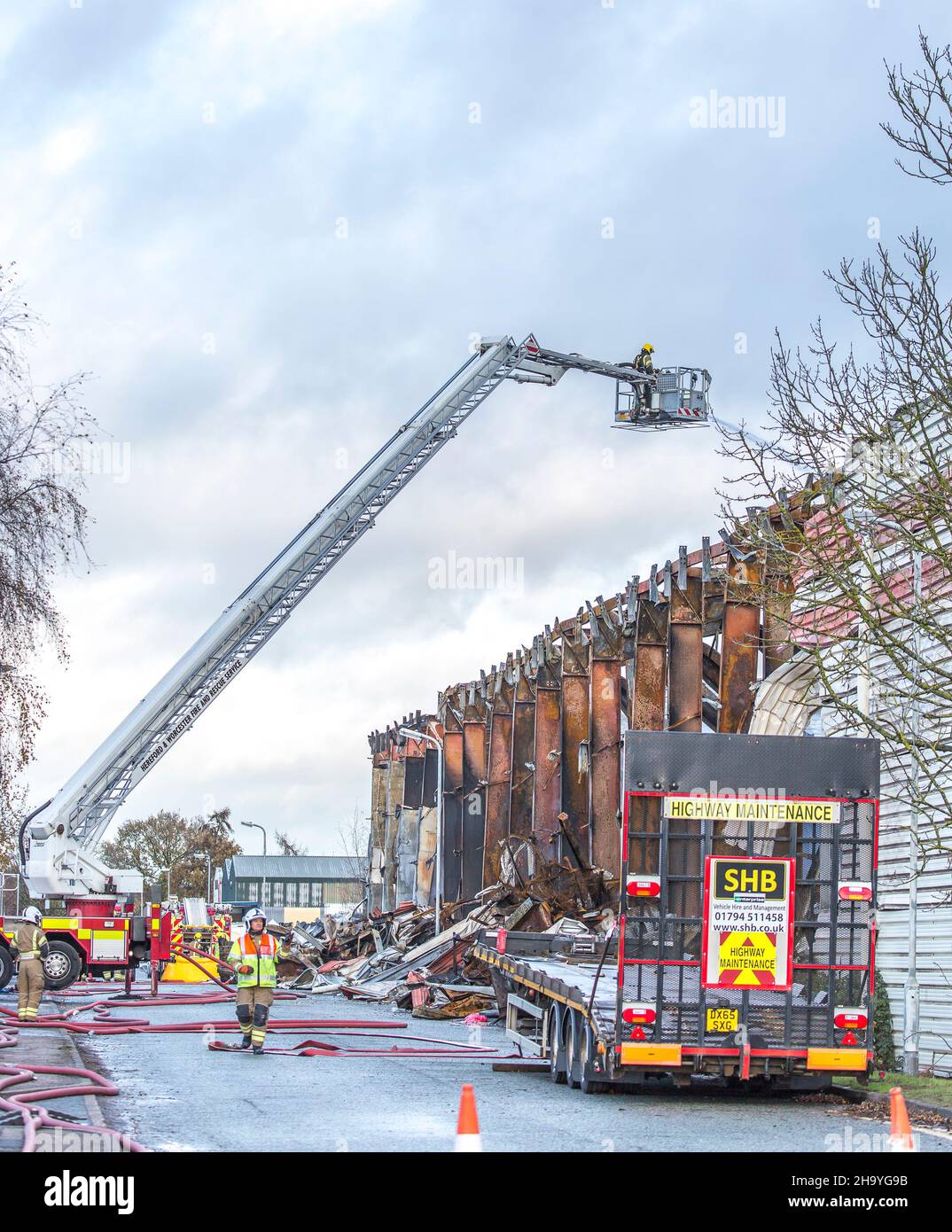 Kidderminster, UK, 8th December, 2021. Fire crews and police are still ...