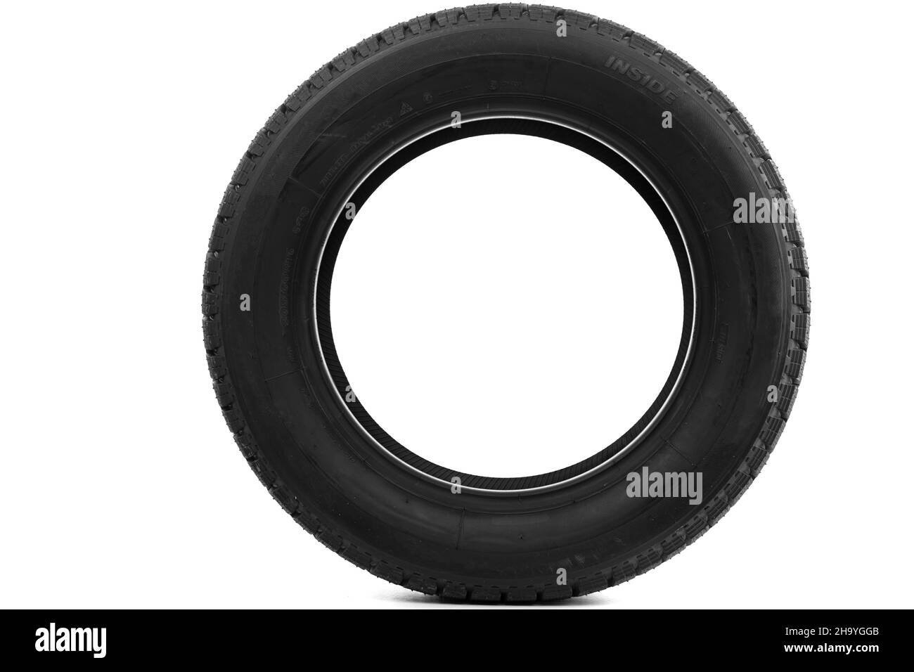 round car tire on white wall background Stock Photo - Alamy