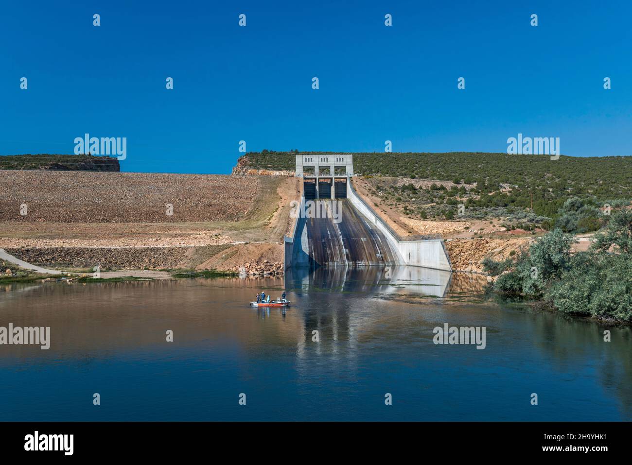 Anglers at boat below spillway at Alcova Dam, built 1935-1938, view ...