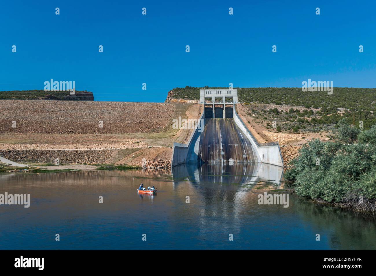 Anglers at boat below spillway at Alcova Dam, built 1935-1938, view ...