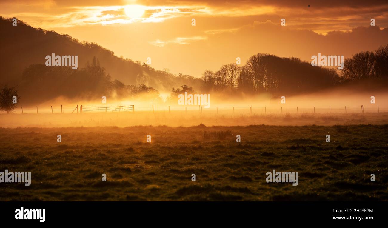 Beautiful misty sunset in hi-res stock photography and images - Alamy