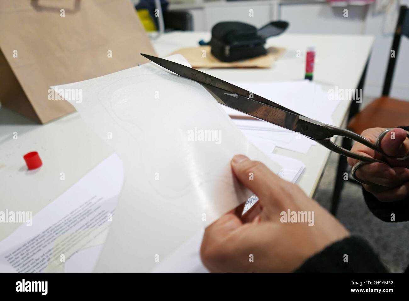 paperwork, cutting paper in a graphic studio Stock Photo - Alamy