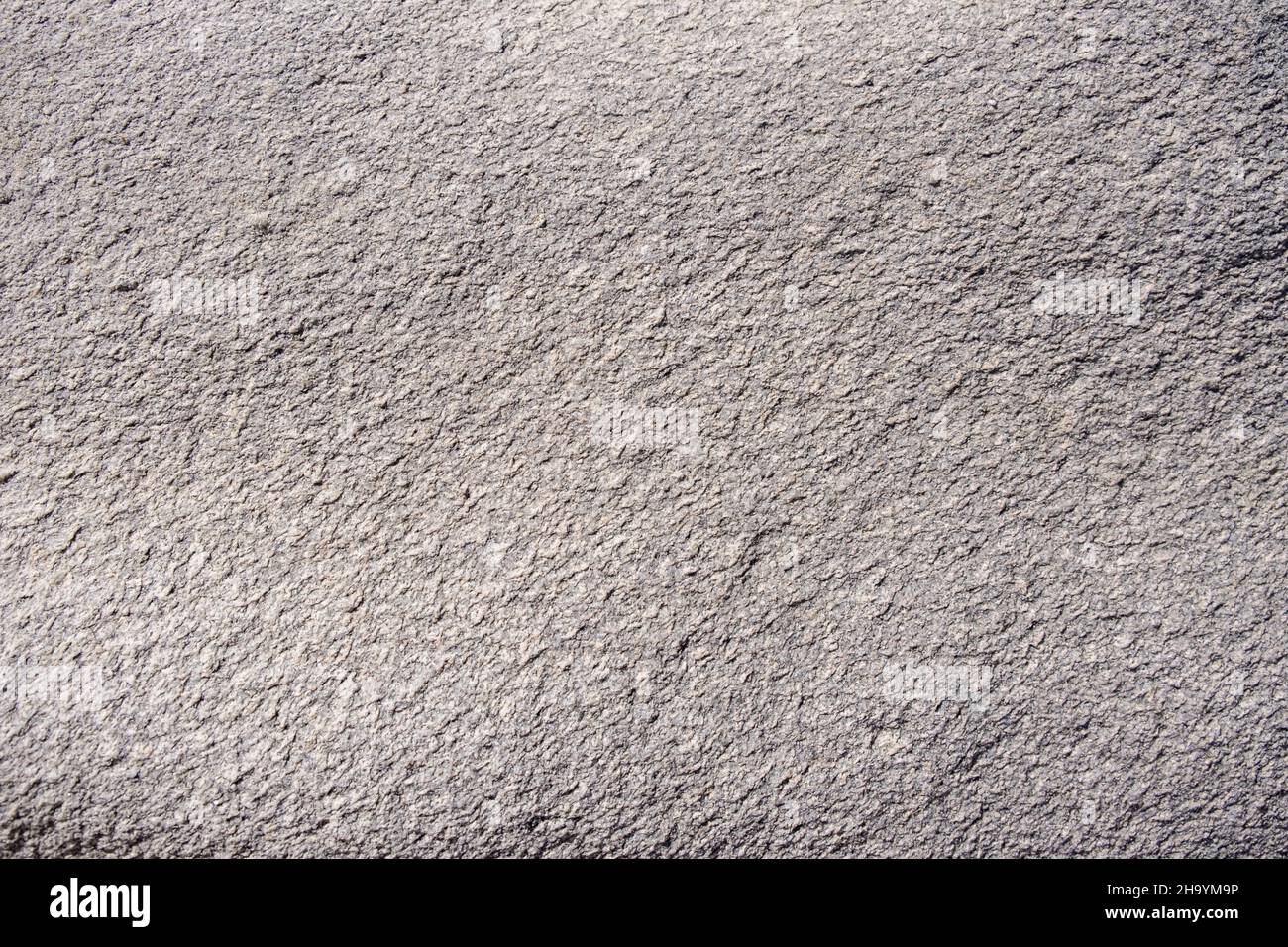 Granite grey rocks formation shaped by the sea salt and wind background ...