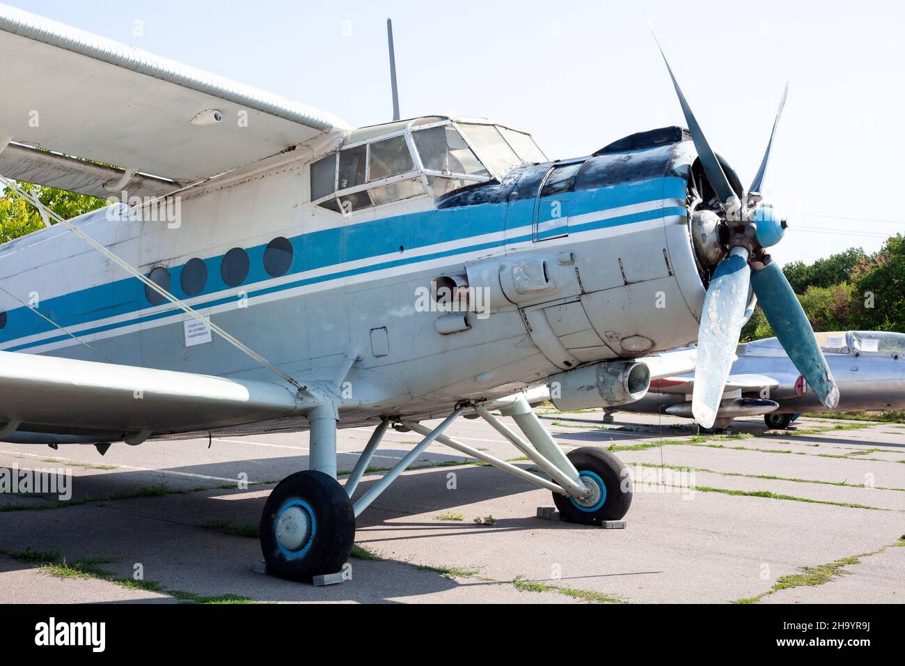 Old soviet aircraft biplane Antonov AN-2 parked on exhibition area in ...