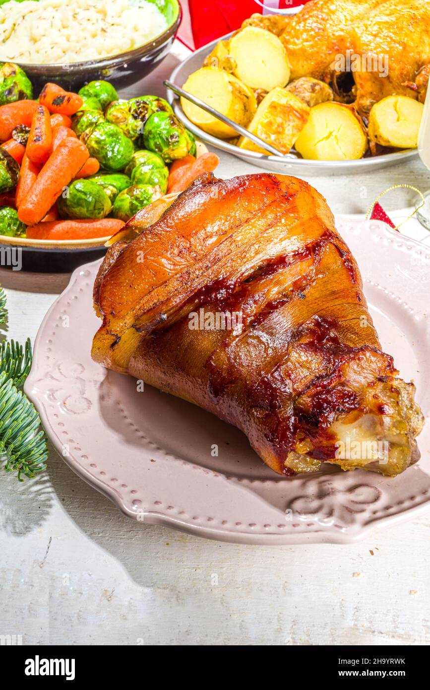 Festive Christmas dinner table with traditional foods and dished ...