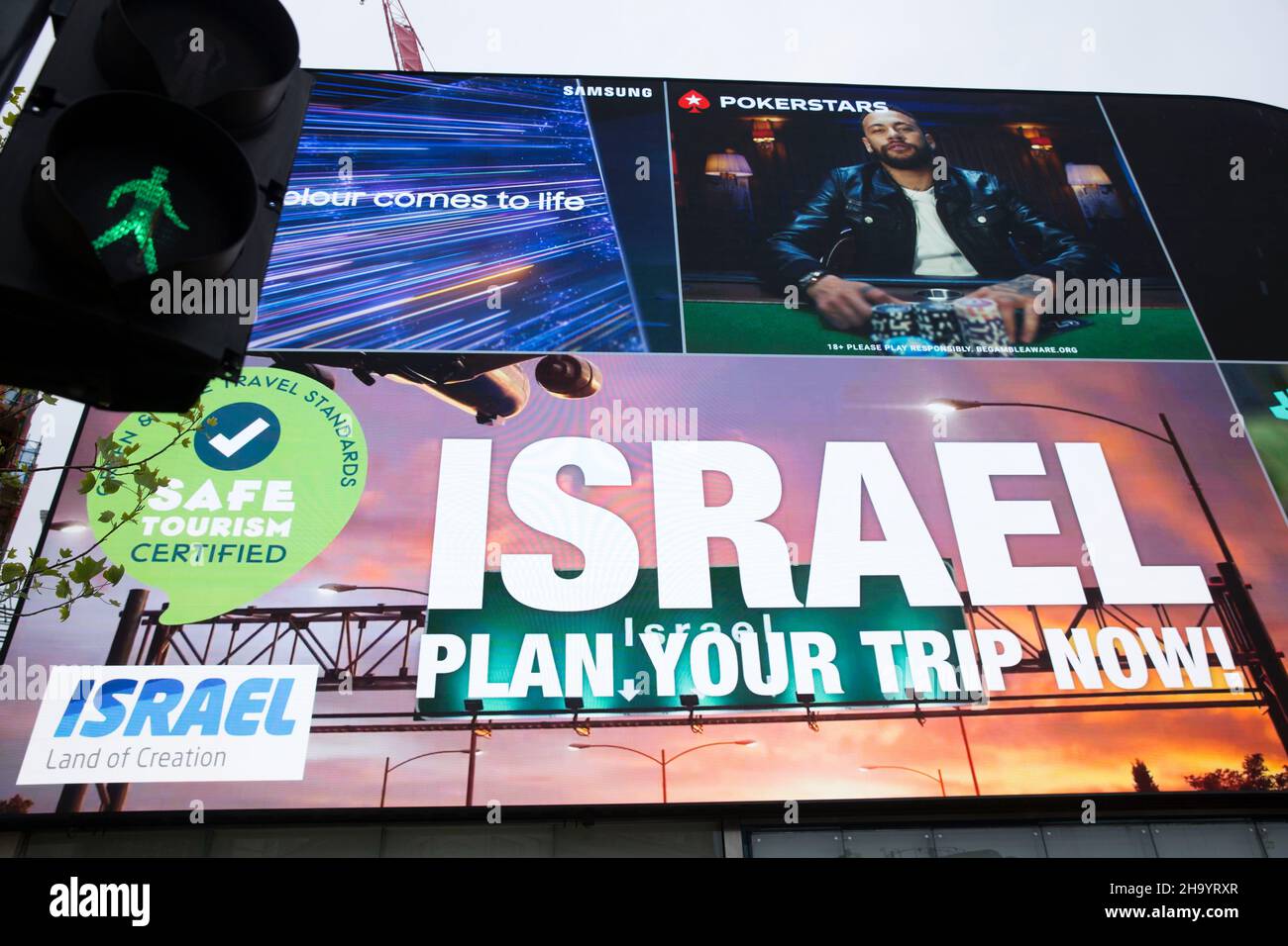 An advertisement for Israeli tourism is displayed on a large electric ...