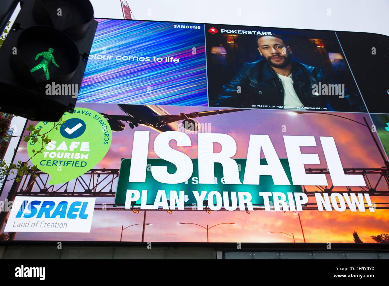 An advertisement for Israeli tourism is displayed on a large electric ...
