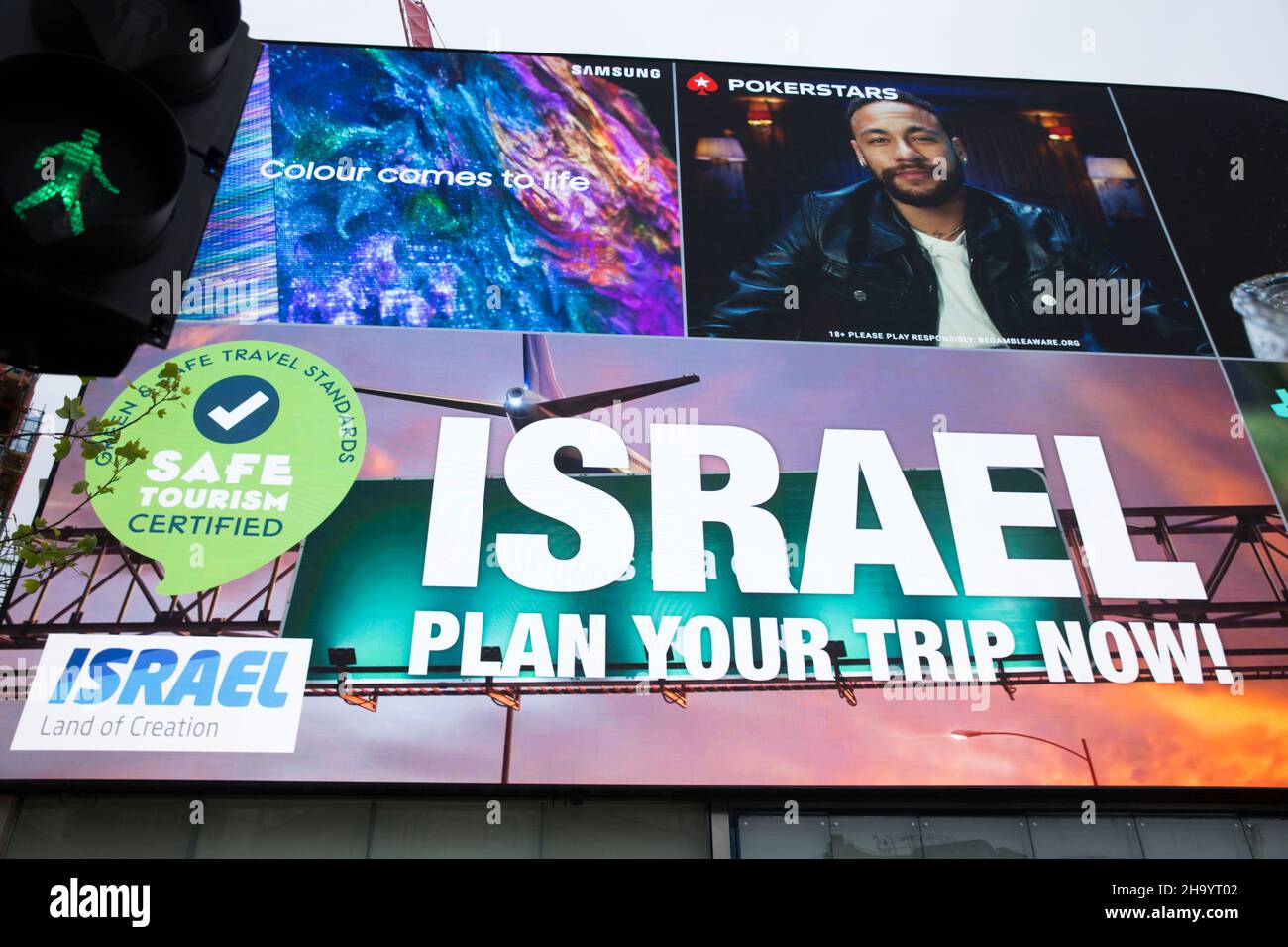 An advertisement for Israeli tourism is displayed on a large electric ...