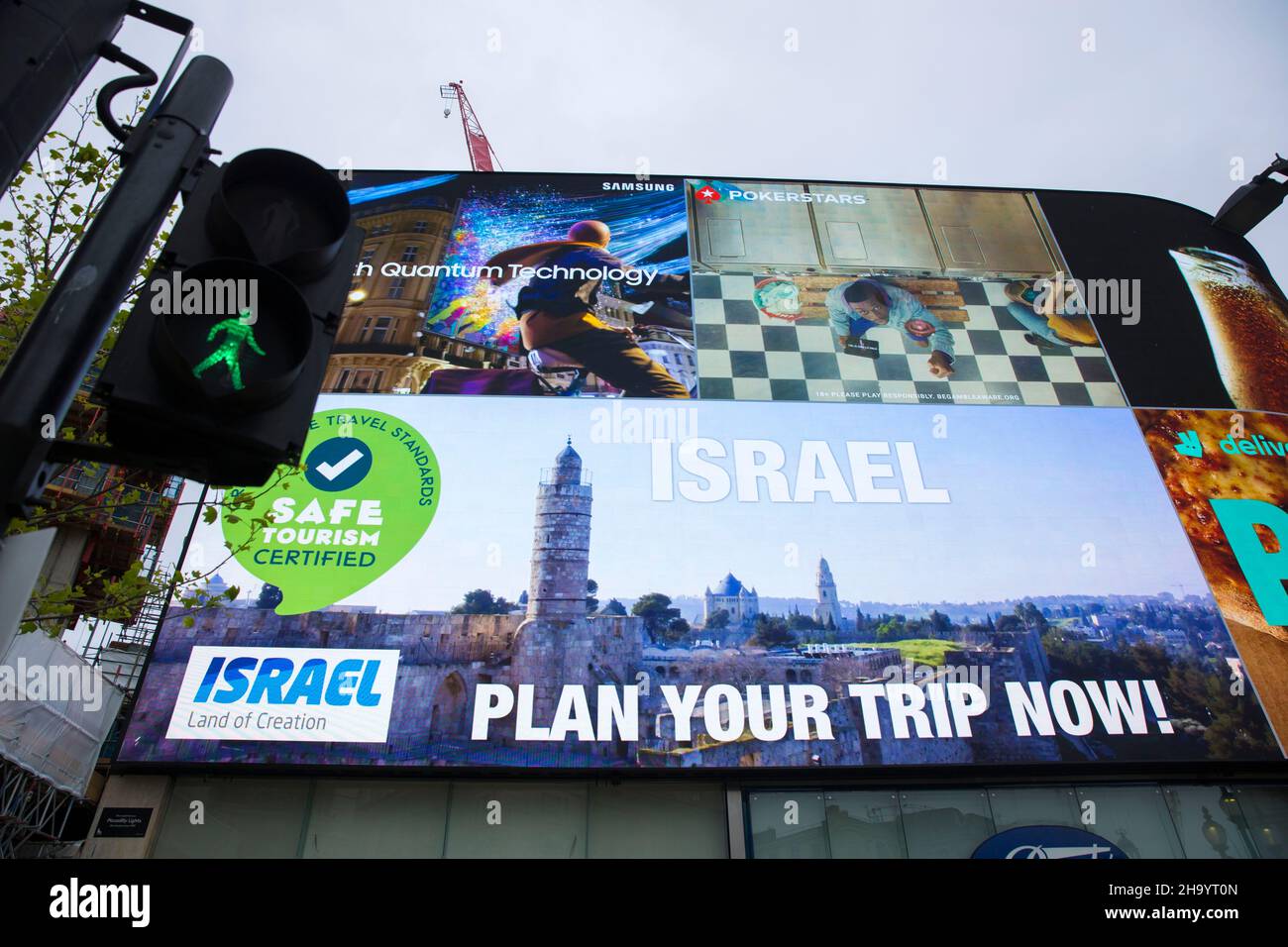 An advertisement for Israeli tourism is displayed on a large electric ...
