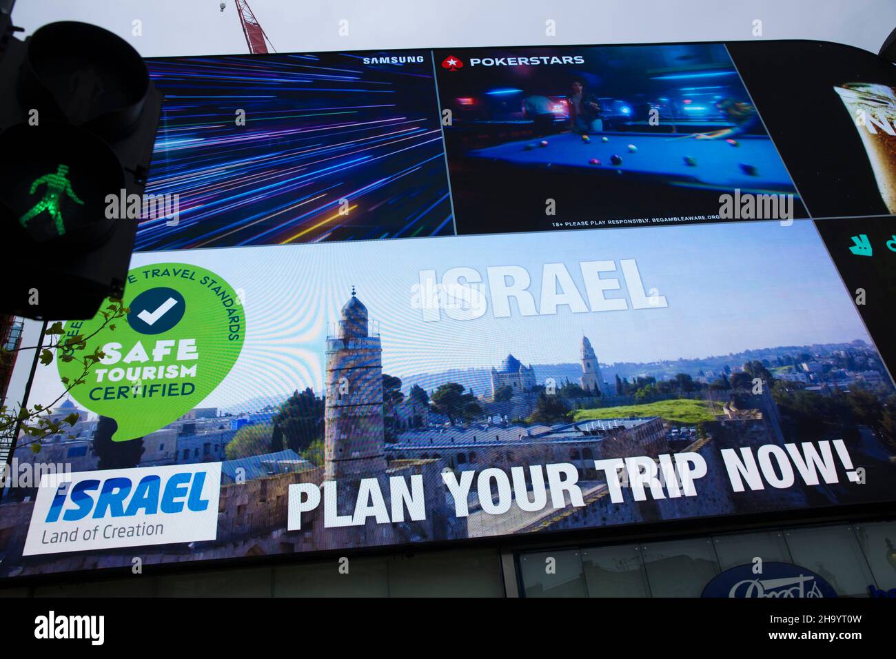 An advertisement for Israeli tourism is displayed on a large electric ...