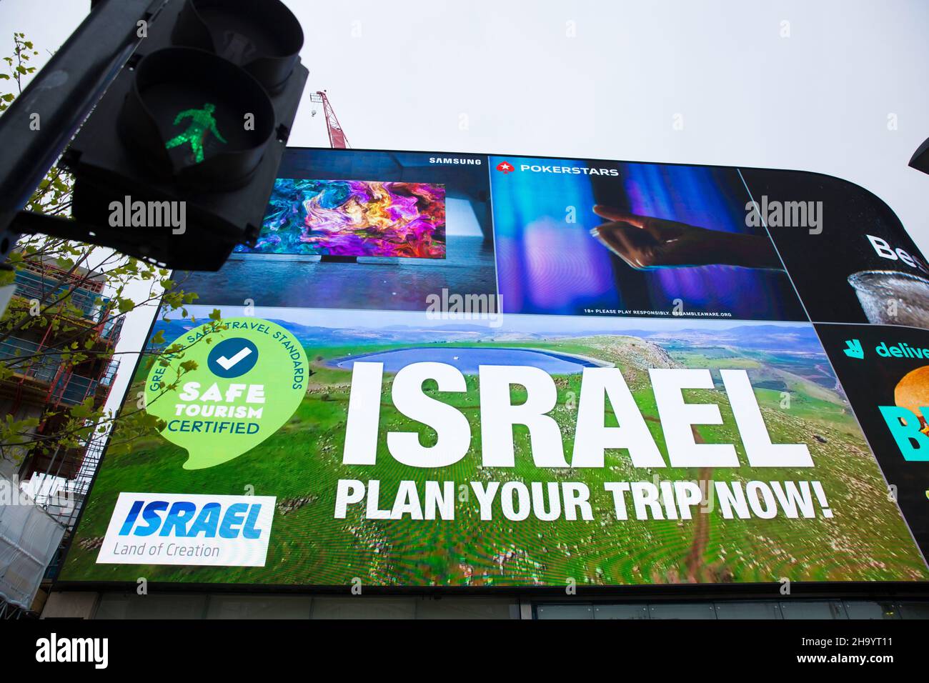 An advertisement for Israeli tourism is displayed on a large electric ...