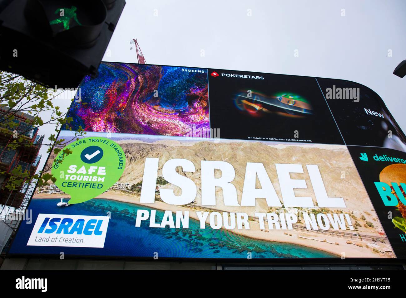 An advertisement for Israeli tourism is displayed on a large electric ...