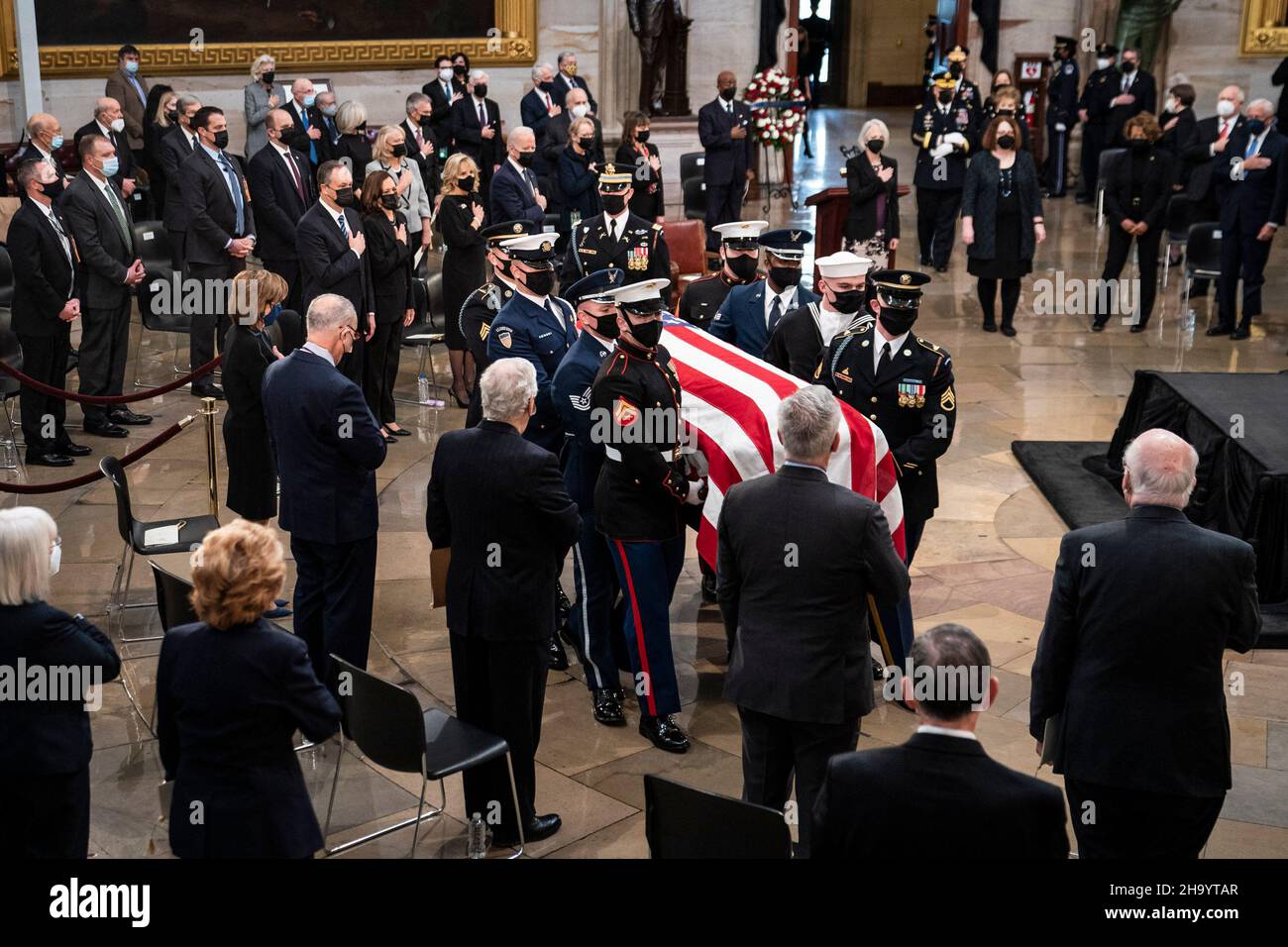 The casket of former Sen. Bob Dole, R-Kan., arrives in the Rotunda of ...