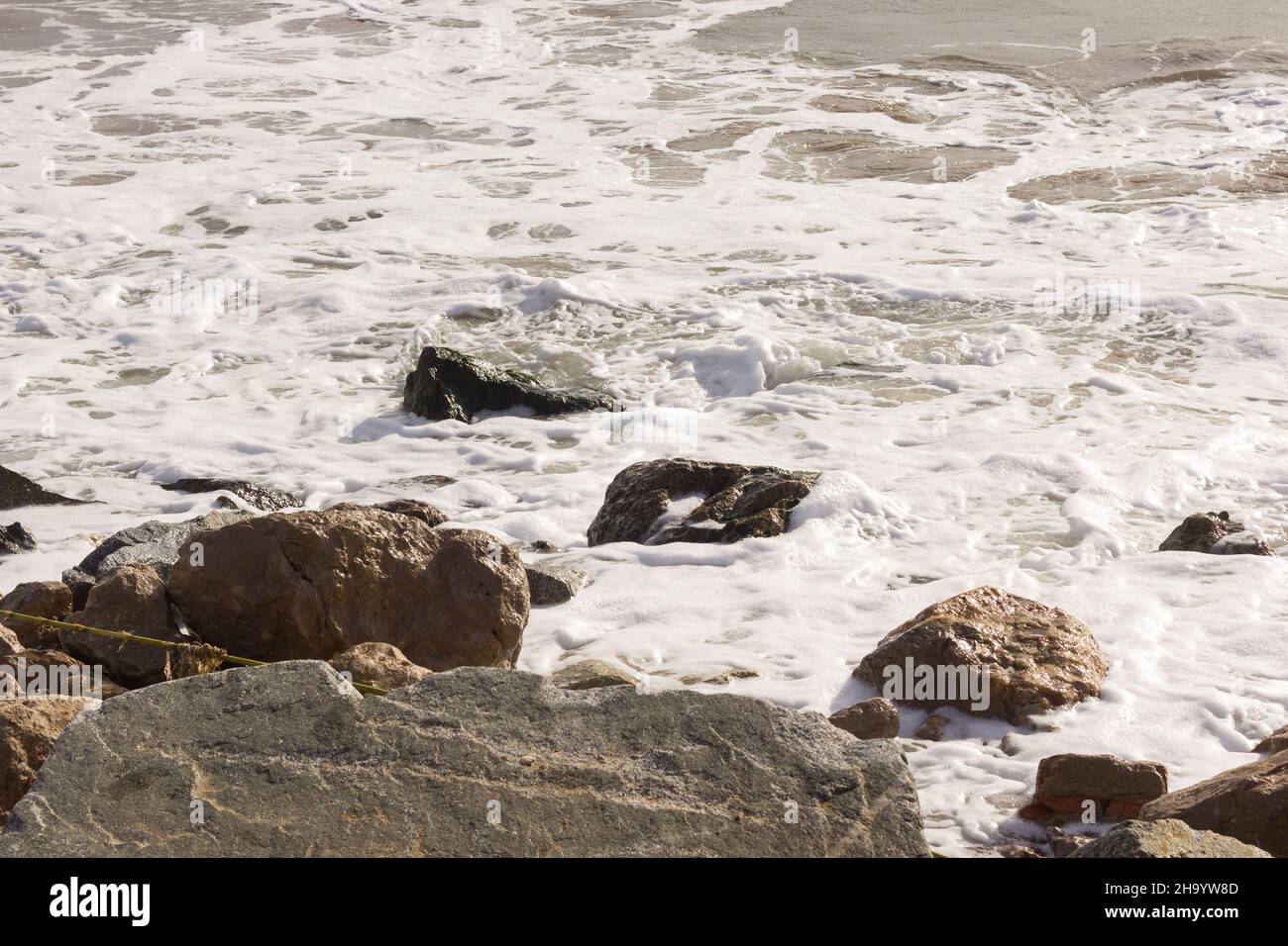 Water breaks on the rocks hi-res stock photography and images - Alamy