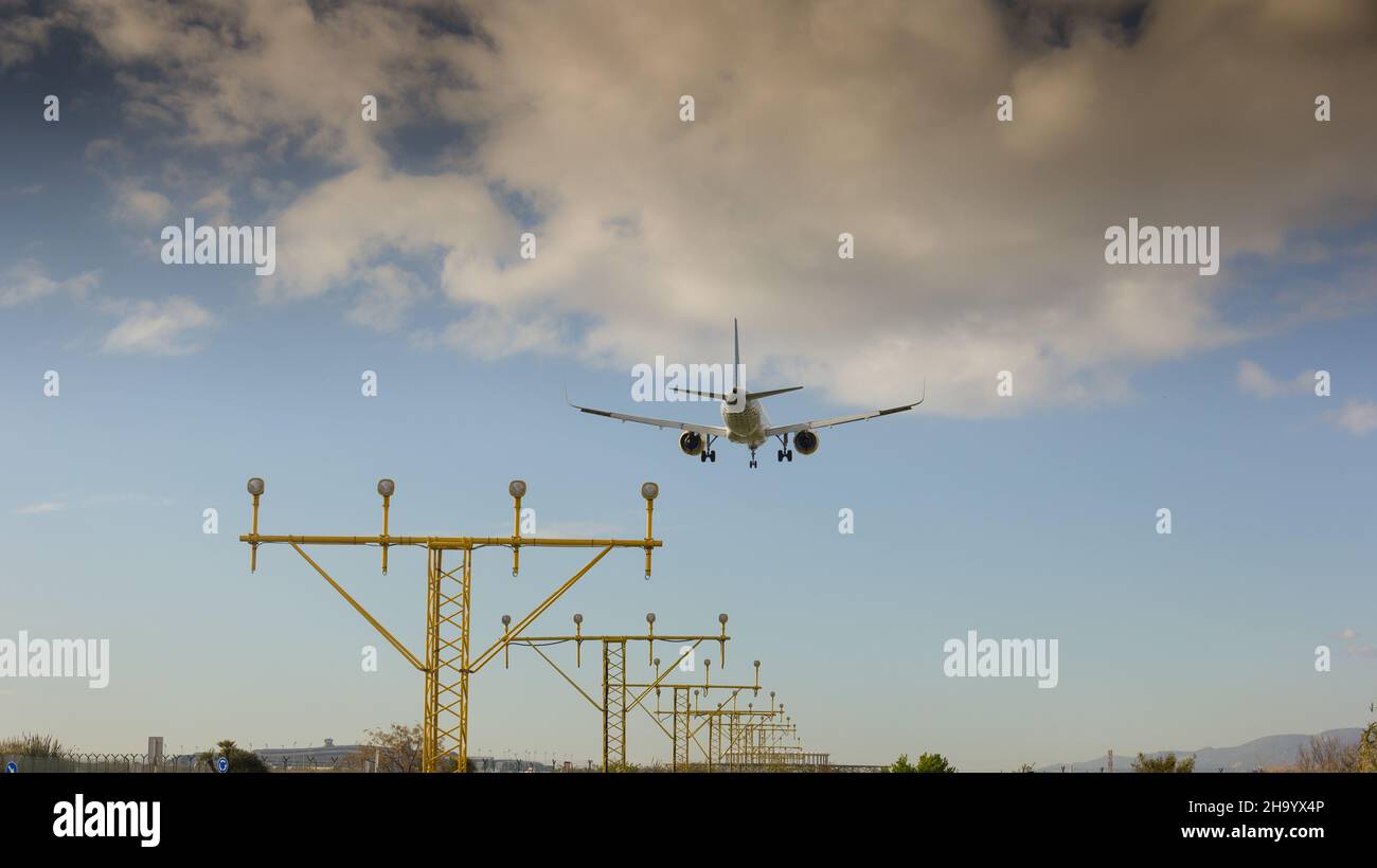 Passenger aircraft on approach to the airport for landing Stock Photo ...