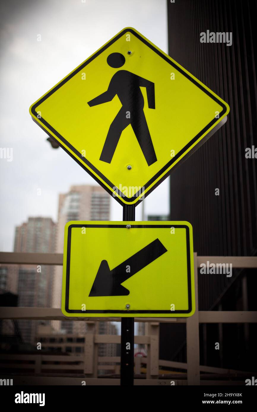 Sign Pedestrian walk left Stock Photo - Alamy
