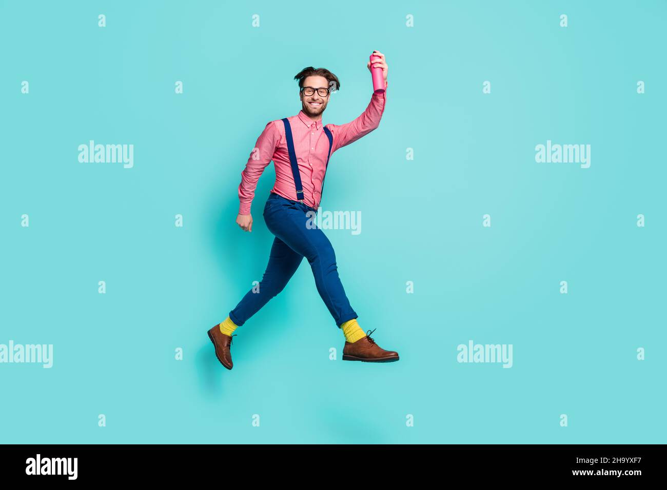 Full length profile side photo of young man happy positive smile wave ...