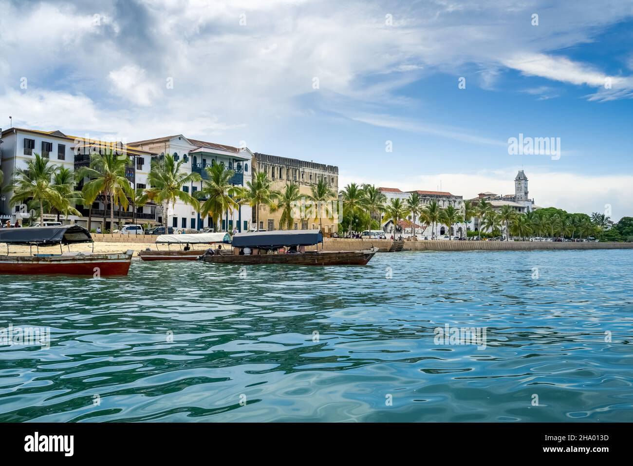 The skyline of Stone Town in Zanzibar seen from the water. sunny day ...