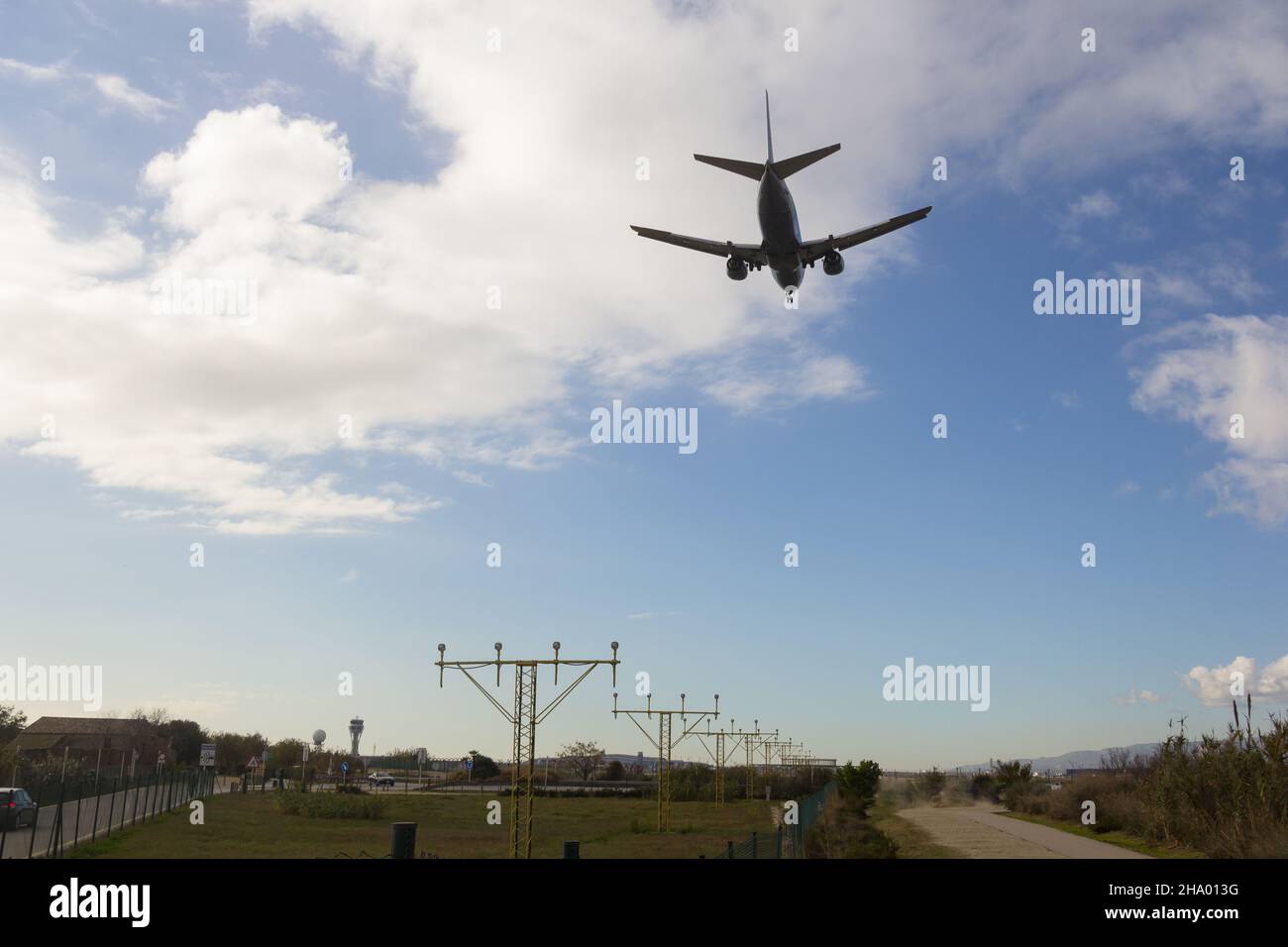 Passenger aircraft on approach to the airport for landing Stock Photo ...
