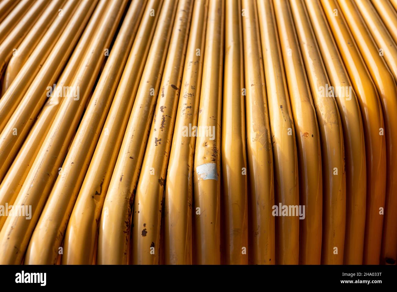 Abstract - Yellow tubing Stock Photo - Alamy