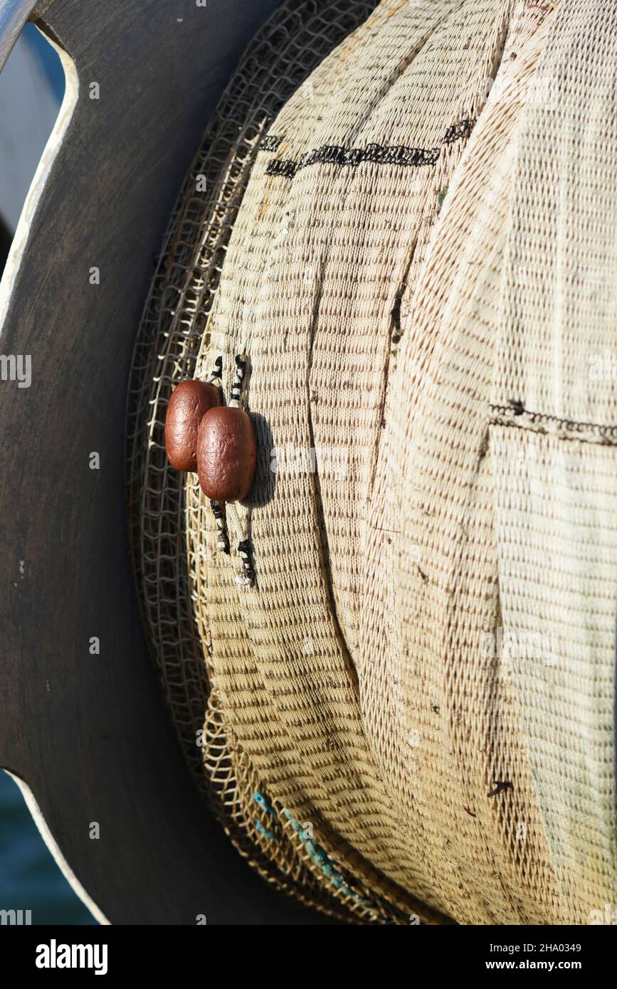 Old fishing nets in the port. Fishing nets texture Stock Photo - Alamy