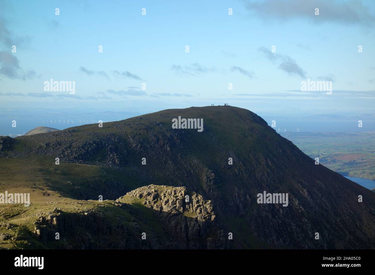 Walking Group of People on the Summit of the Wainwright 'Red Pike' in ...