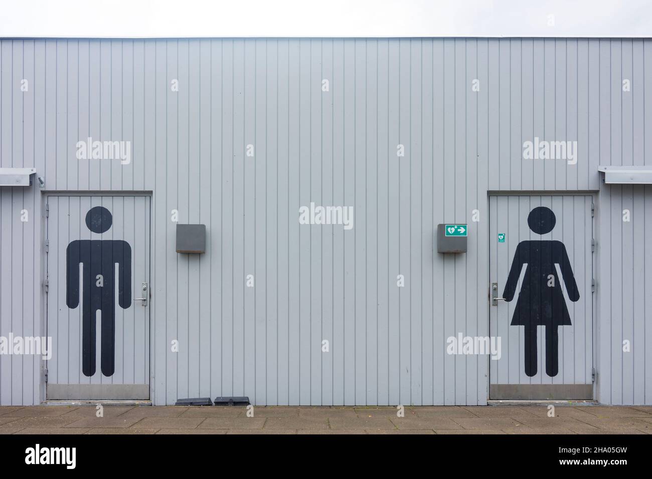 Aarhus: public toilet with big signs for men and women, in Aarhus ...