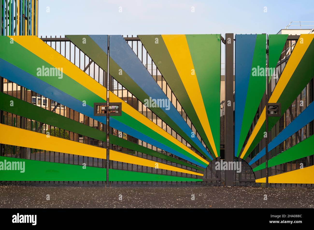 Metal gate in the shape of the sun and sun rays Stock Photo - Alamy
