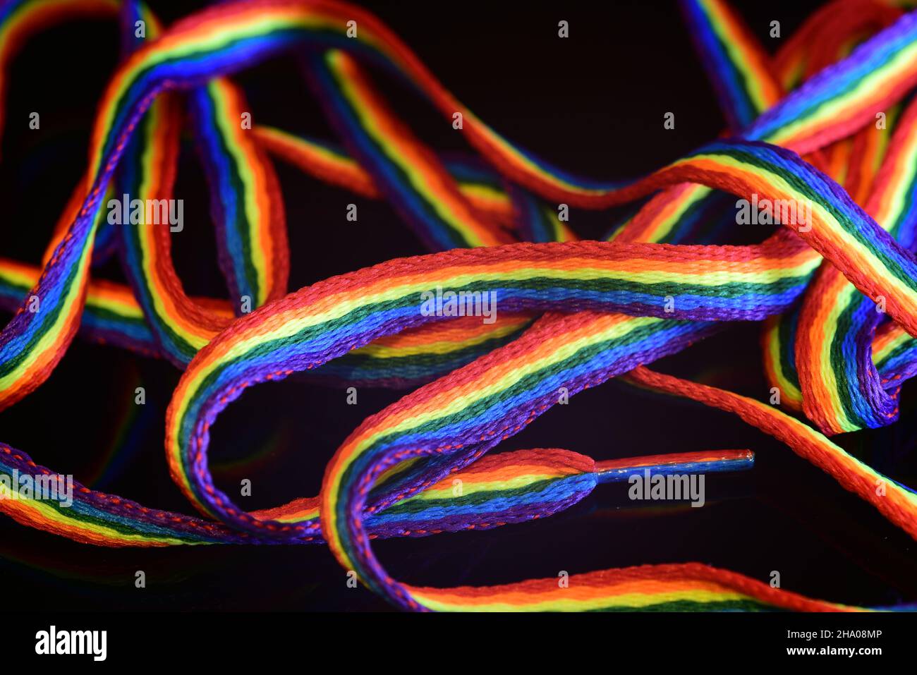 Rainbow Laces on black background Stock Photo - Alamy