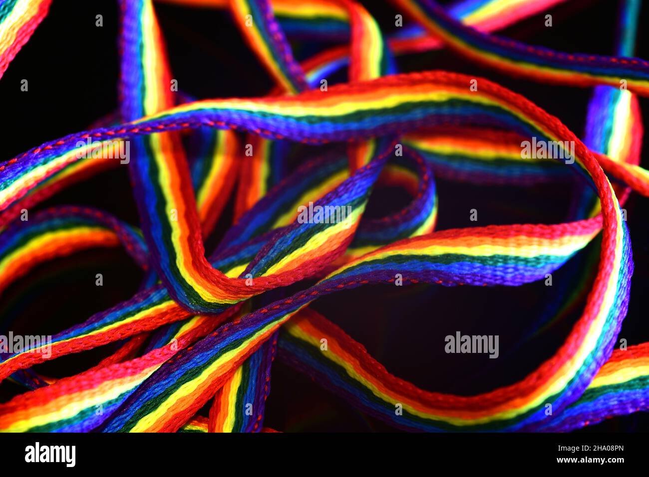 Rainbow Laces on black background Stock Photo - Alamy