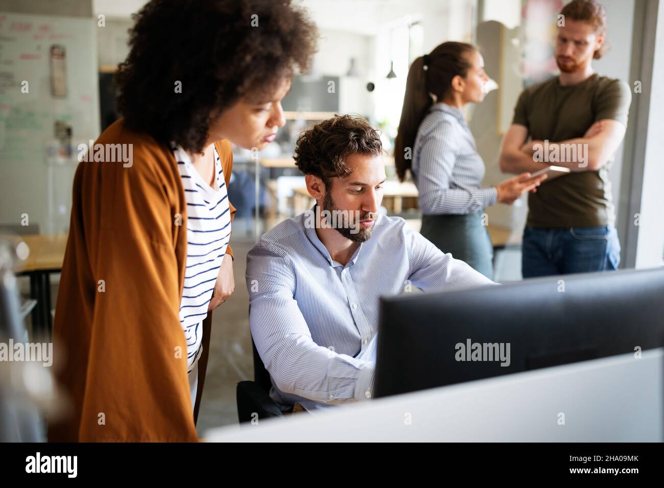 Software engineers working on project and programming in company Stock ...