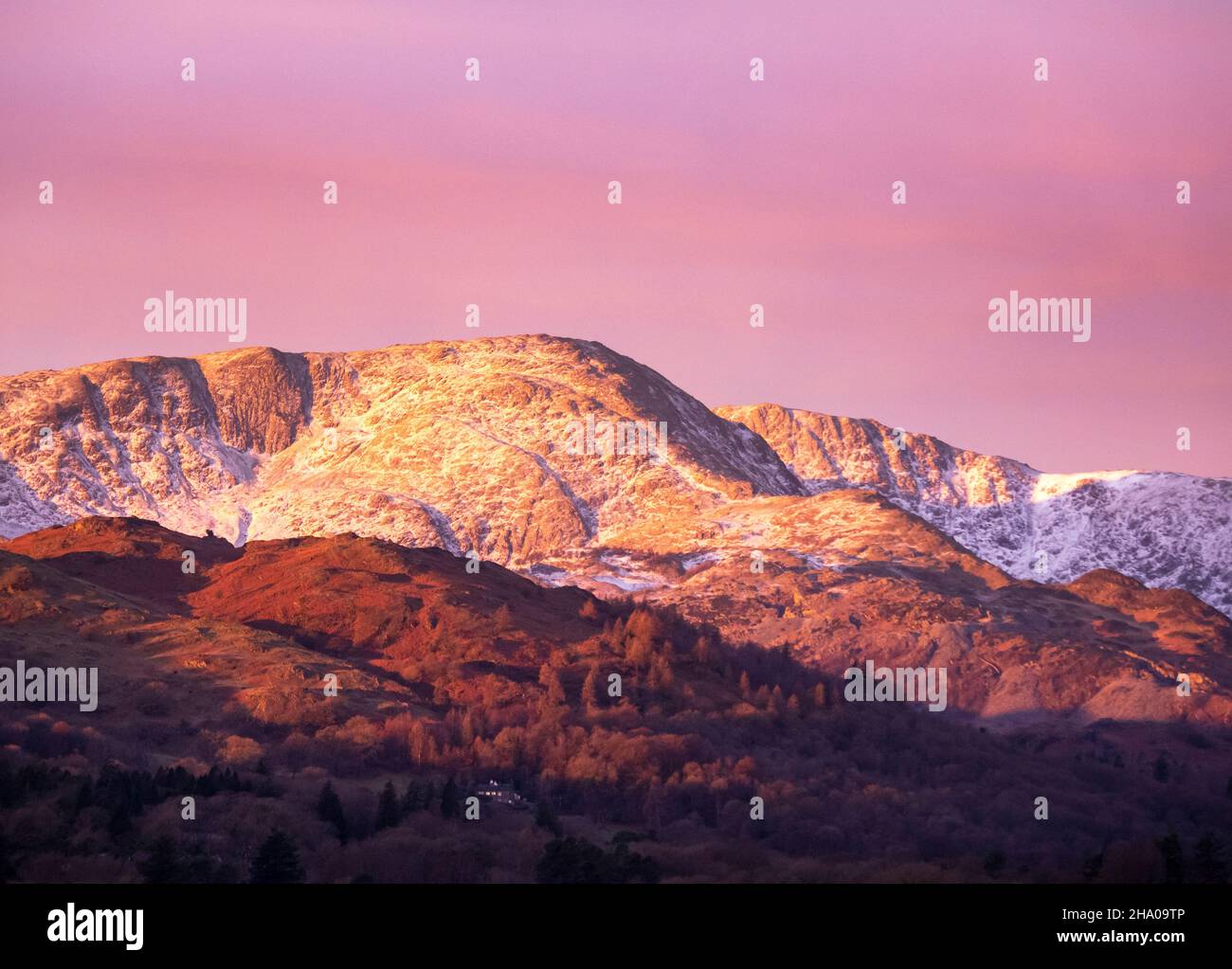Snow on Wetherlam at sunrise from Ambleside in the Lake District, UK ...