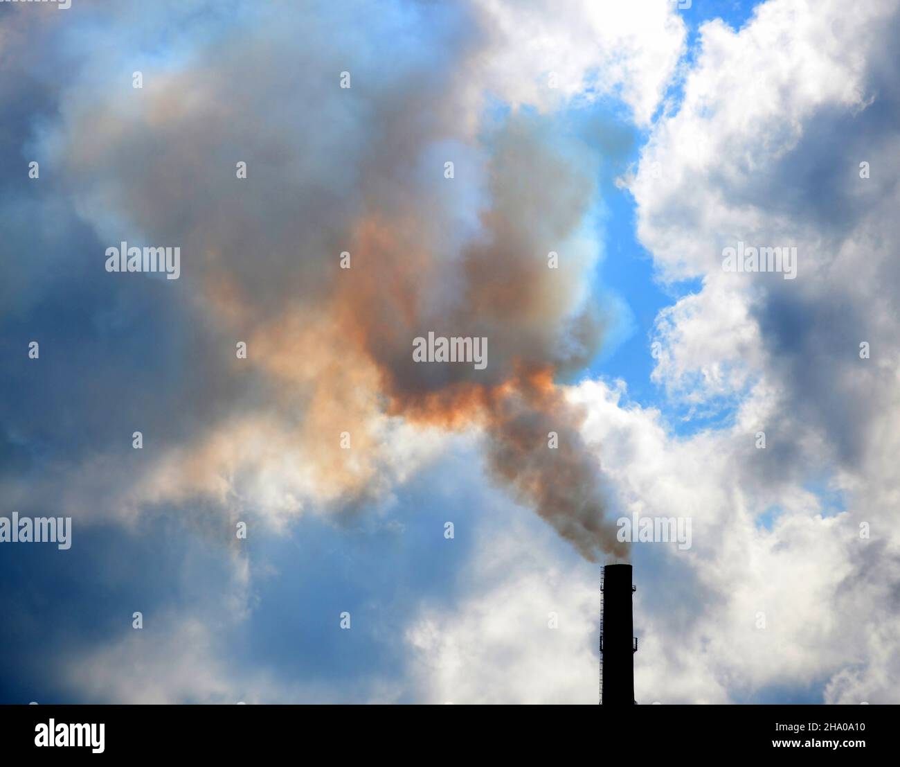 pipe with thick smoke and the sky, clouds Stock Photo - Alamy