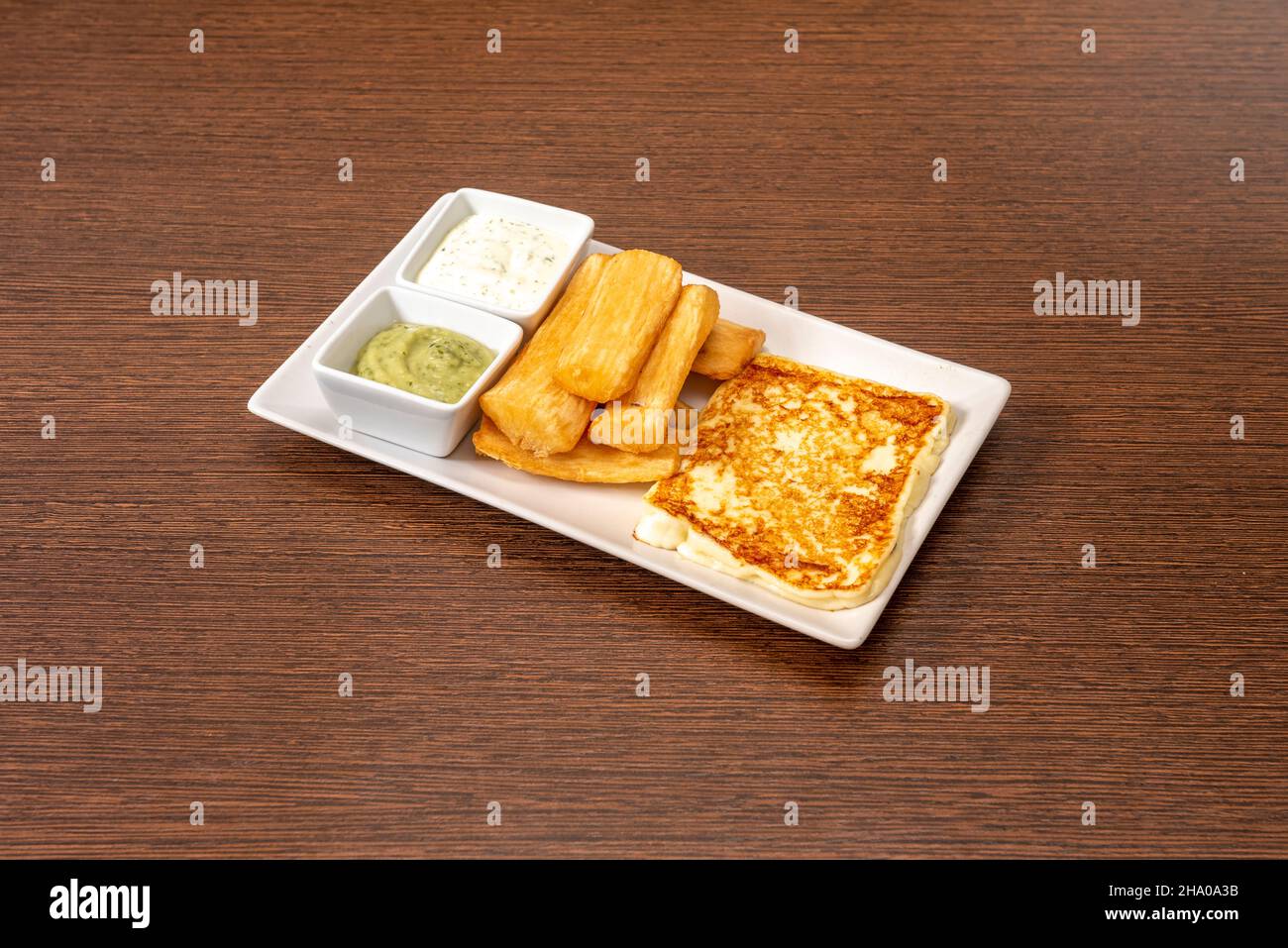 Combination plate with fried yucca sticks and cheese omelette with ...