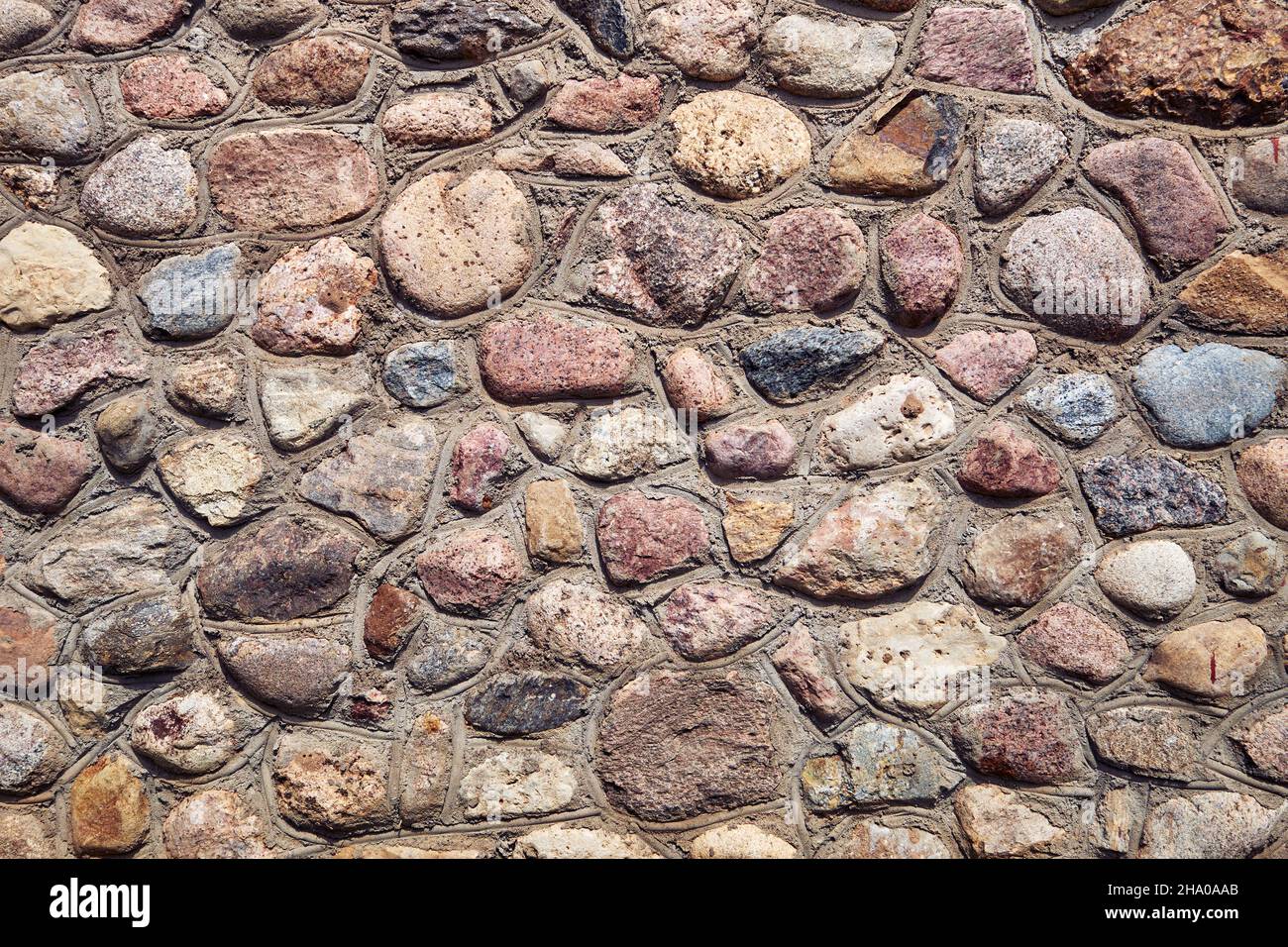 Ancient building wall from stones. The background of old stones ...