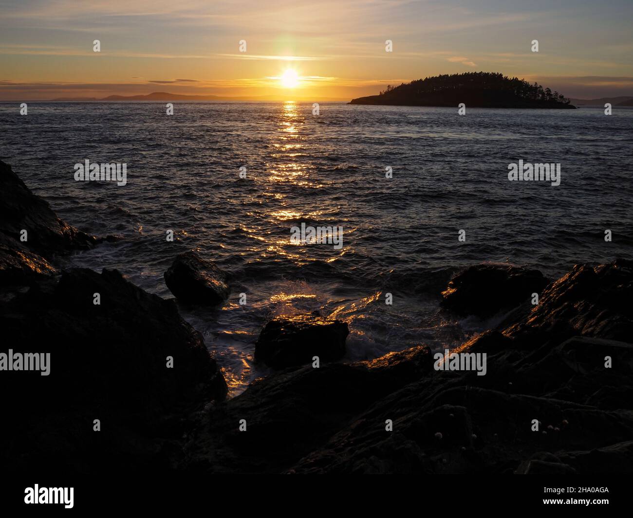 WA19848-00...WASHINGTON - Sunset from West Point on the west edge of ...