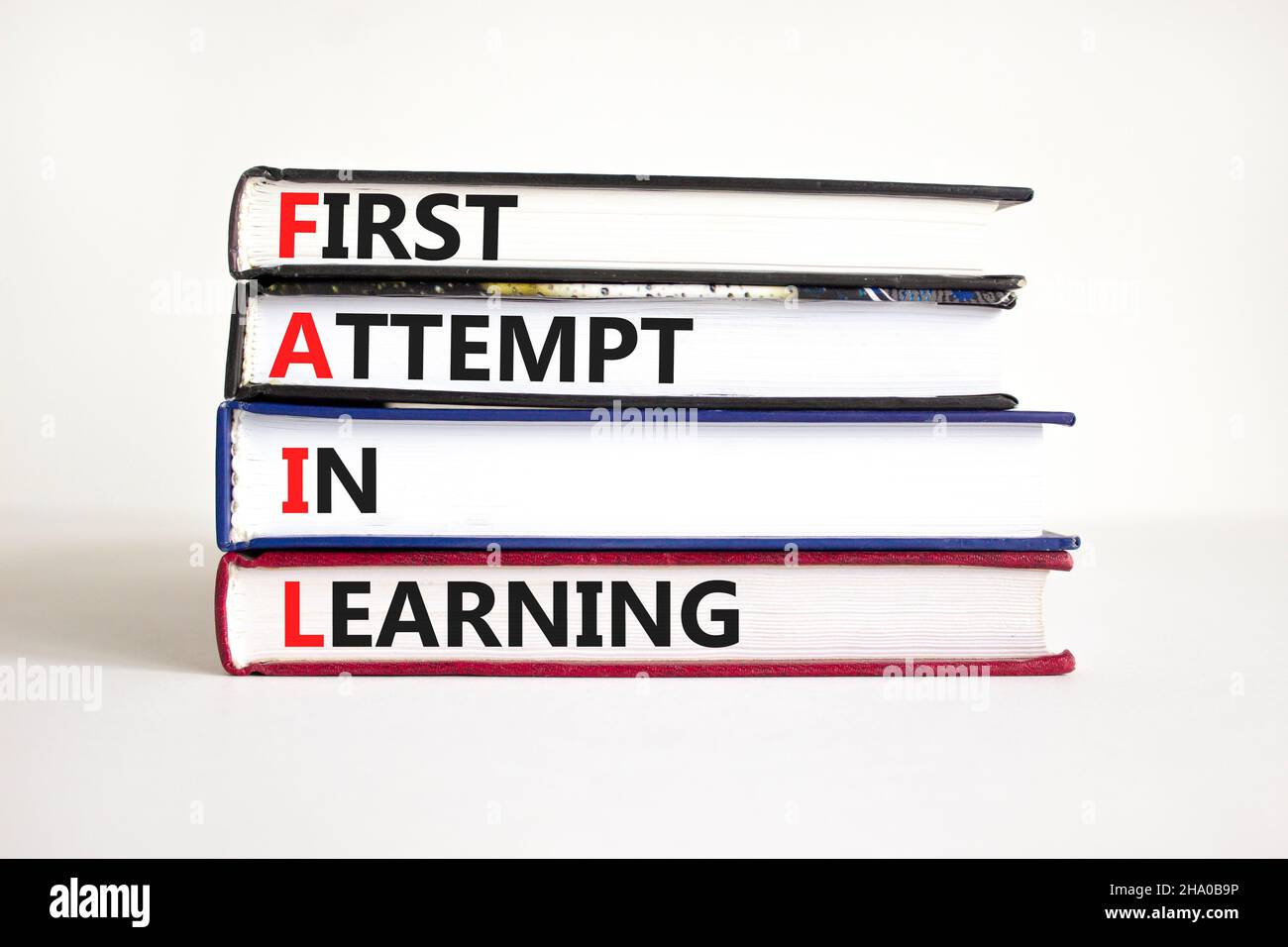 FAIL first attempt in learning symbol. Books with words FAIL first ...