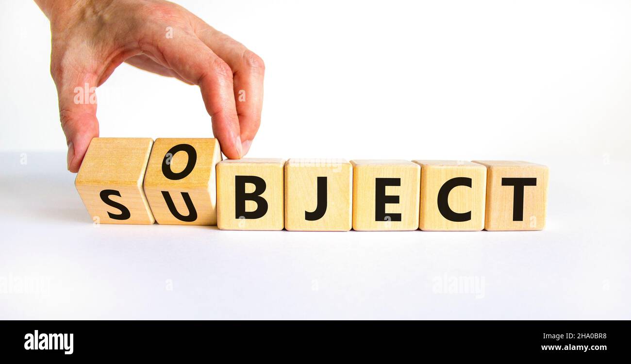 Subject and object symbol. Businessman turns a cube, changes the word ...