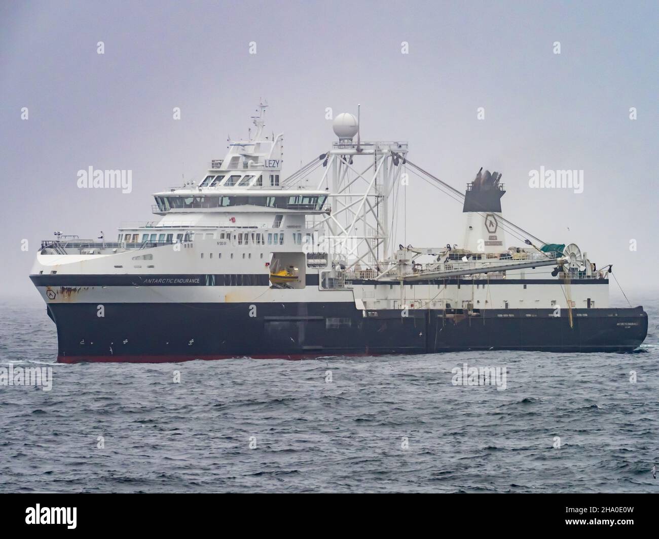 Krill fishing vessel Antarctic Endurance fishing amongst whales near ...